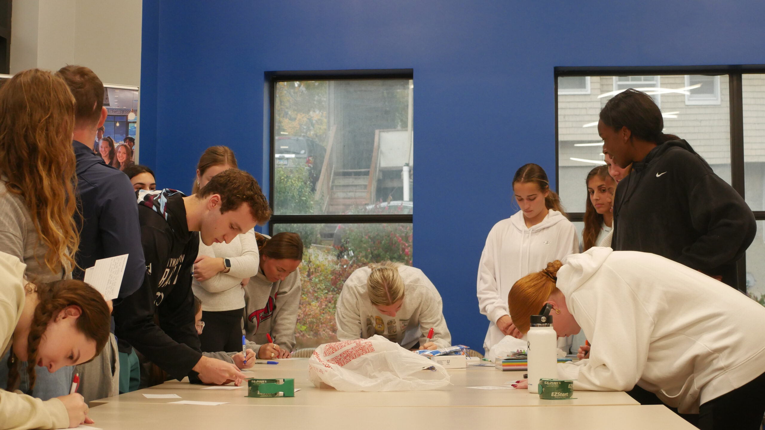 PHOTOS: Women’s soccer players, other KU students help pack boxes of ...